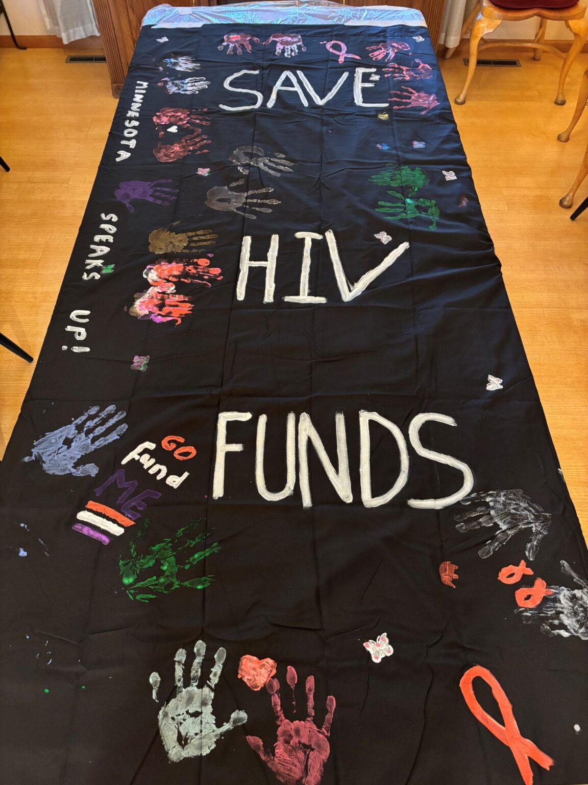 Advocates Use Art to Fight Federal HIV Cuts in Honor of World AIDS Day ...